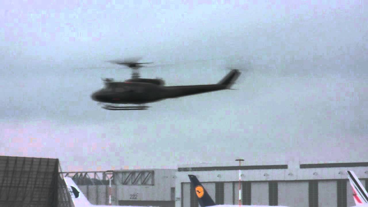 Helicopter overfly the runway - YouTube