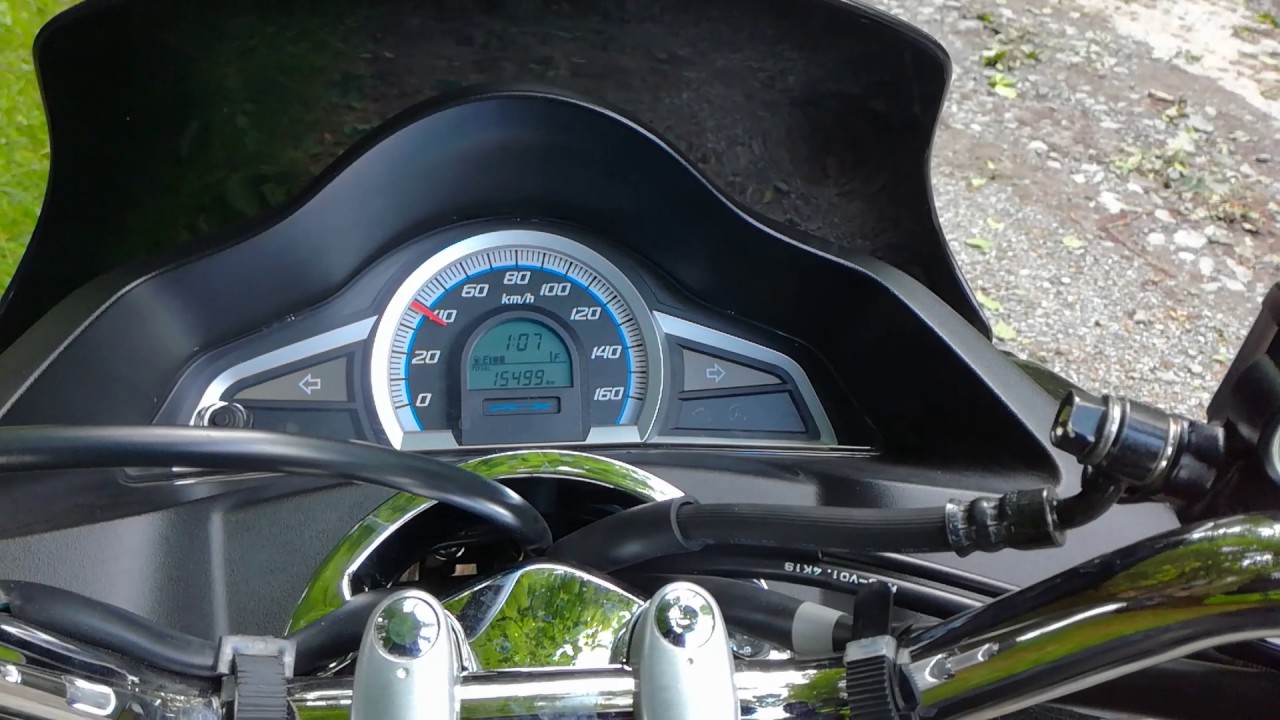 Honda PCX buzzing sound on center stand - YouTube