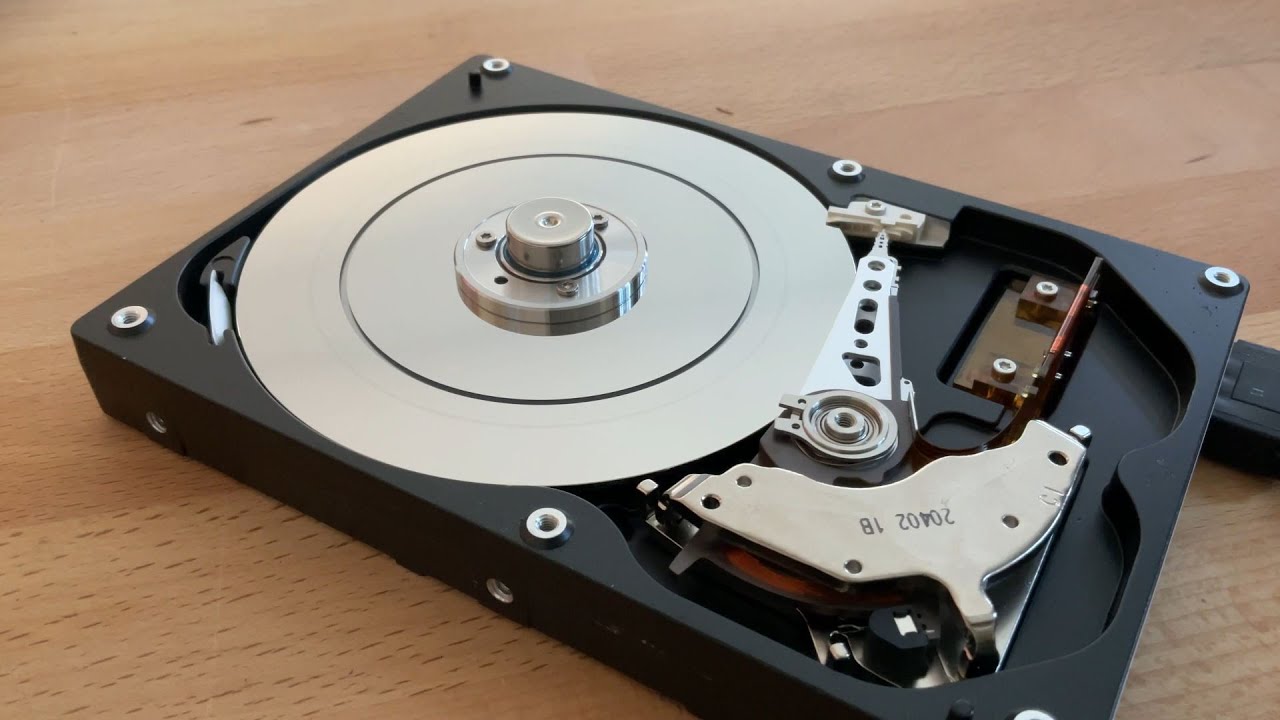 Inside a Failed IBM Deskstar 120GXP 40GB Hard Drive from 2002 - YouTube