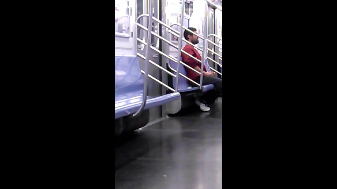 crazy man talking to himself on train/subway - YouTube