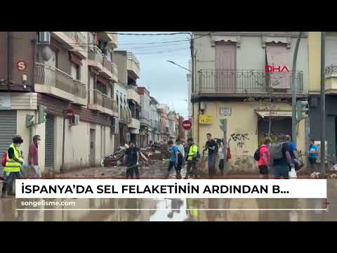 İspanya'da sel felaketinin ardından binlerce kişi sokakları temizledi