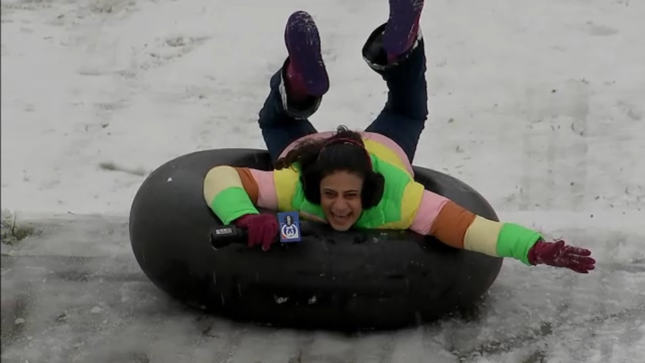 Families spend snow day sledding in Houston - YouTube