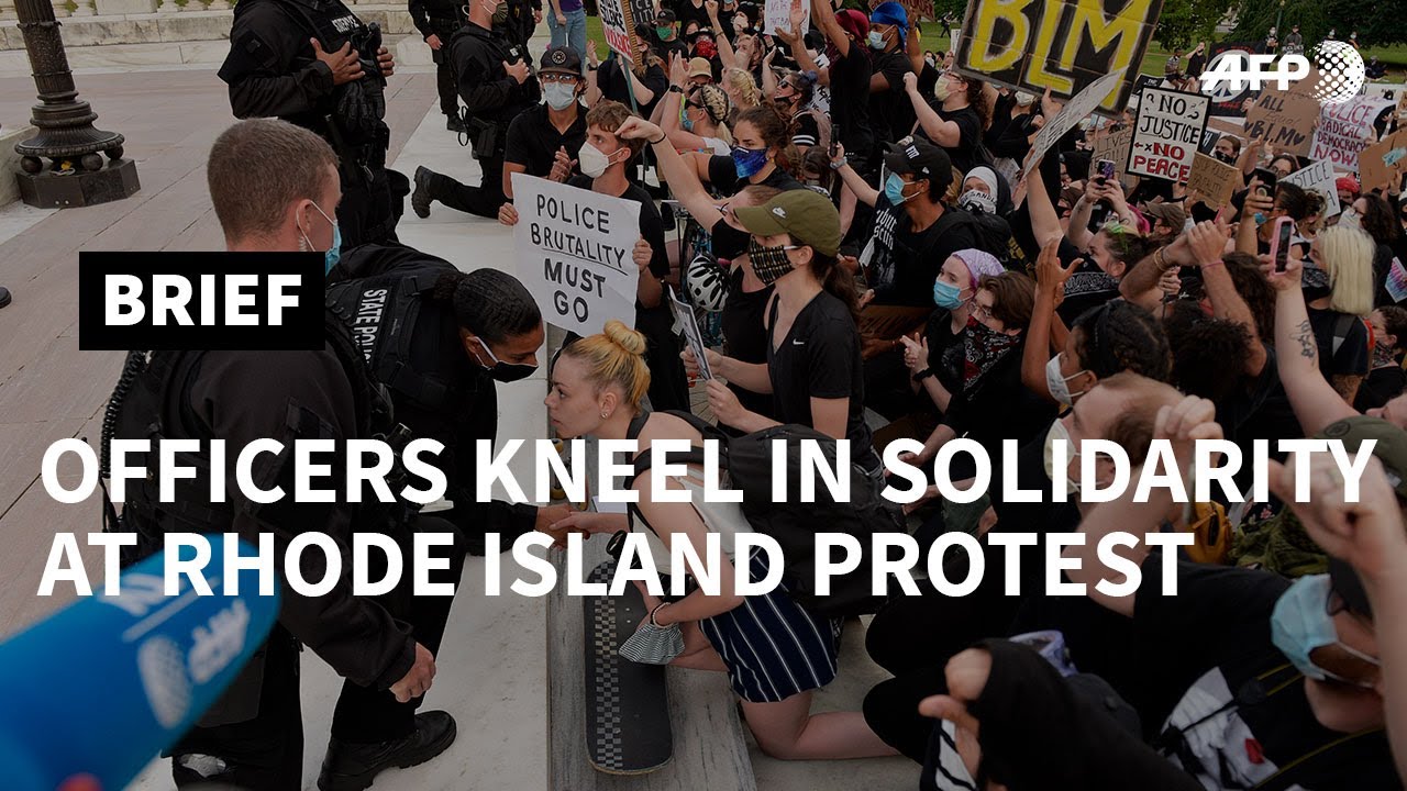 Black rights protests in Rhode Island as officers take a knee | AFP ...