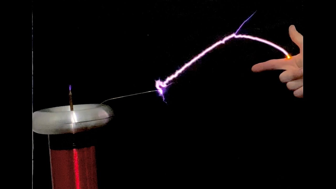Touching A Tesla Coil - YouTube