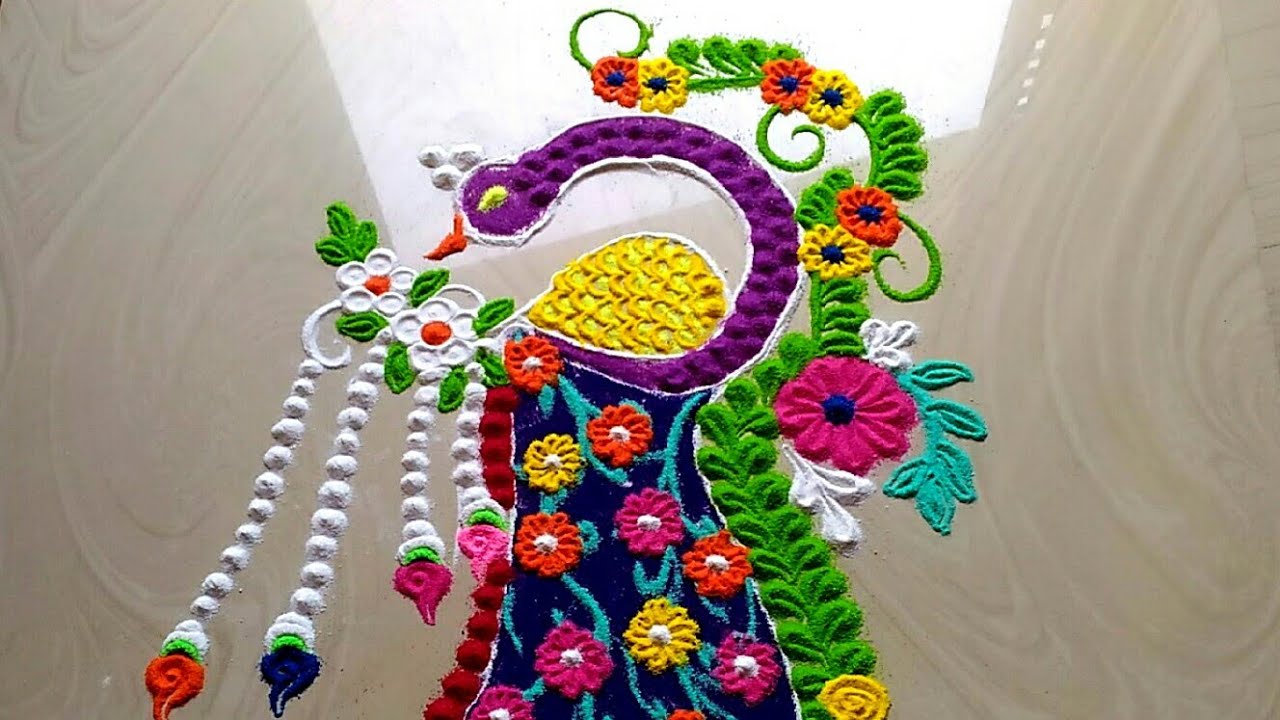 Very innovative and BEAUTIFUL peacock rangoli design by jyoti Rathod ...