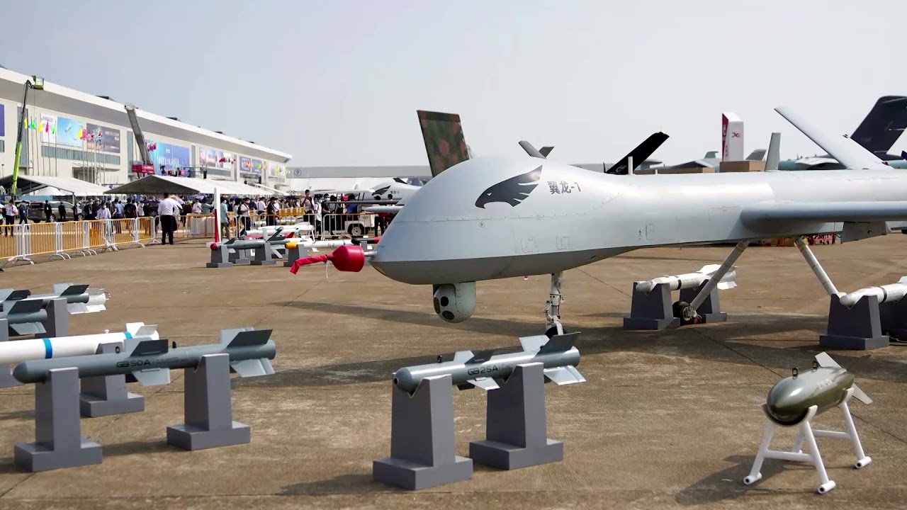 China's high-tech military might soars at air show - YouTube