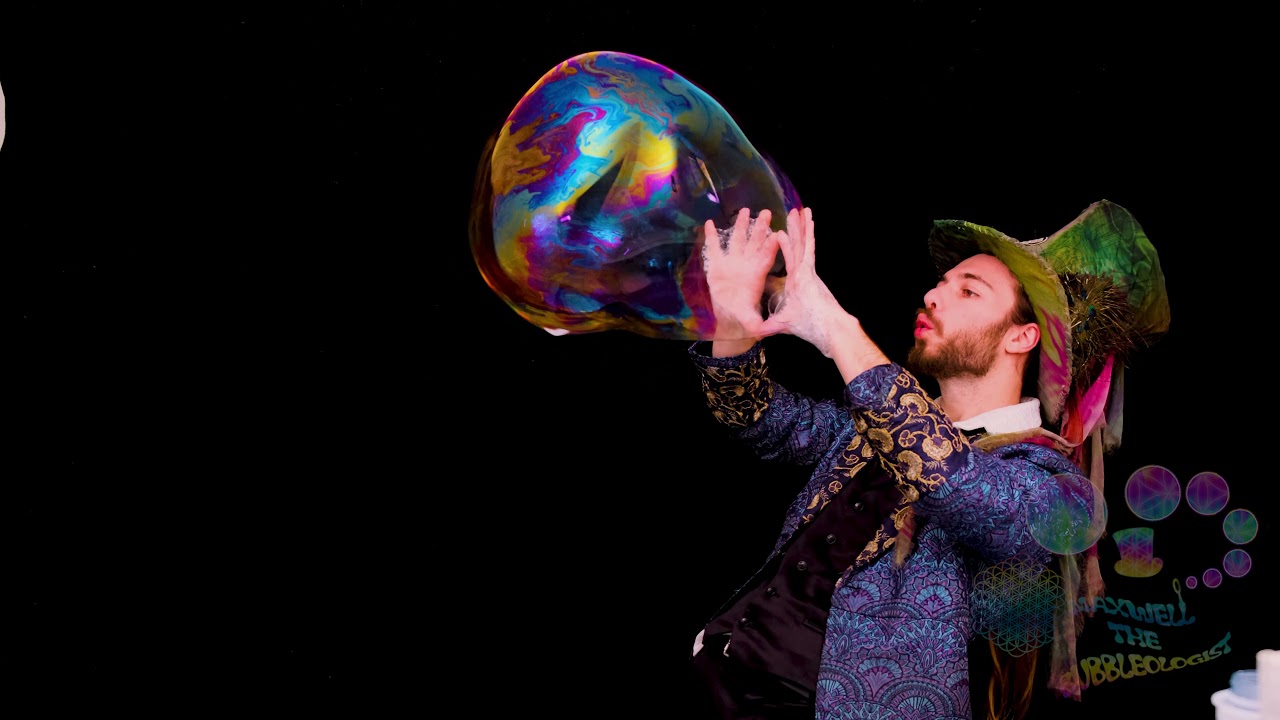 Bubble performer. Maxwell the Bubbleologist. Bubble juggle magic. - YouTube