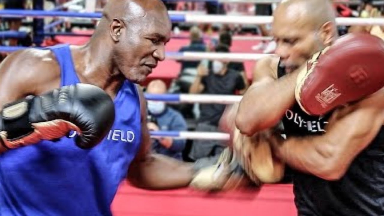EVANDER HOLYFIELD SHOULDNT FIGHT VITOR BELFORT!!! WTF!!! HE COULD DIE ...