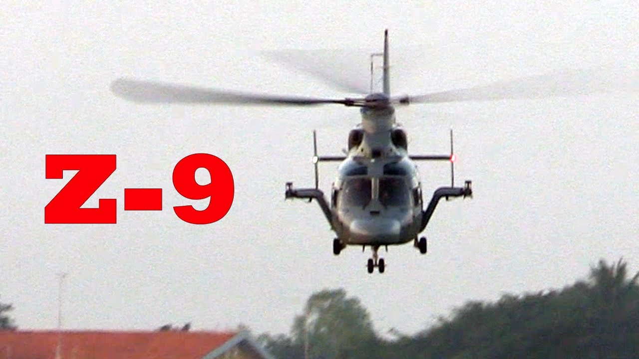CHINESE Z-9 MILITARY HELICOPTERS FLYING VERY LOW AT AIR FIELD - YouTube