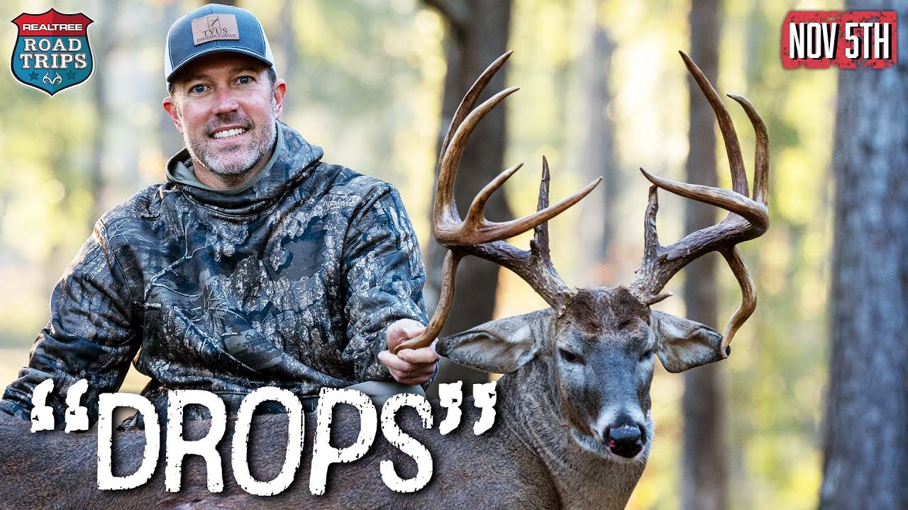 DROPS goes DOWN | GIANT GA BUCK crosses over to the NEIGHBOR | Realtree ...