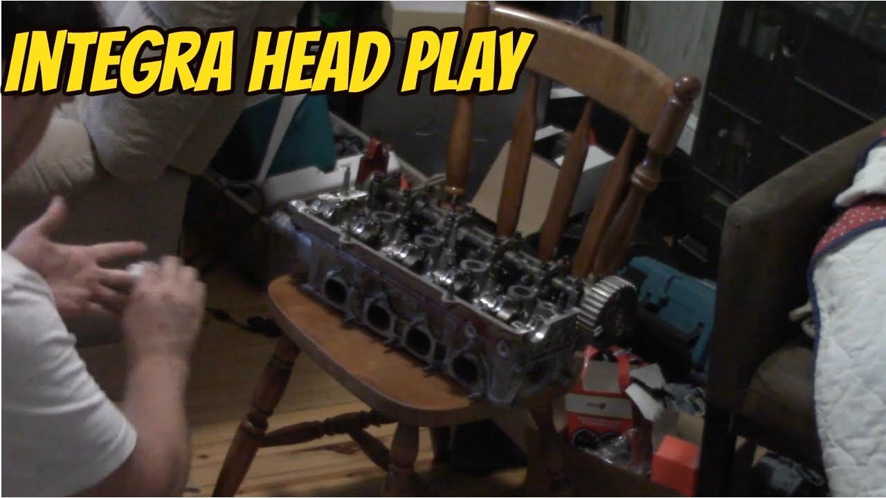 Installing cams and caps on Integra Head - YouTube