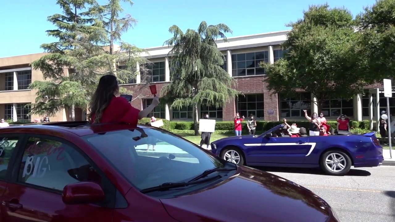 Micah Cheering for fellow seniors @ JBHS Class of 2020 Grad Parade ...