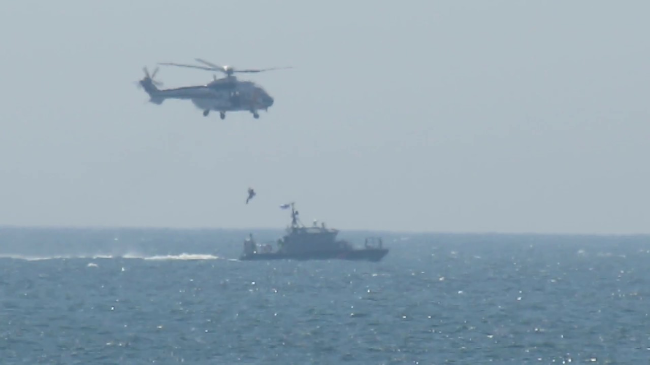 Rescue at sea by chopper. - YouTube