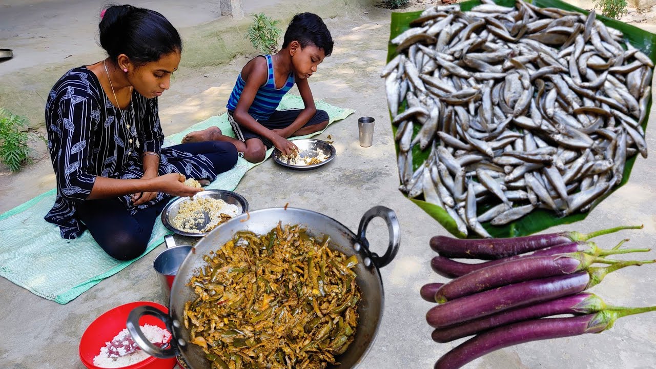 How santali tribe girl cooking Boirali fish recipe with brinjal in ...