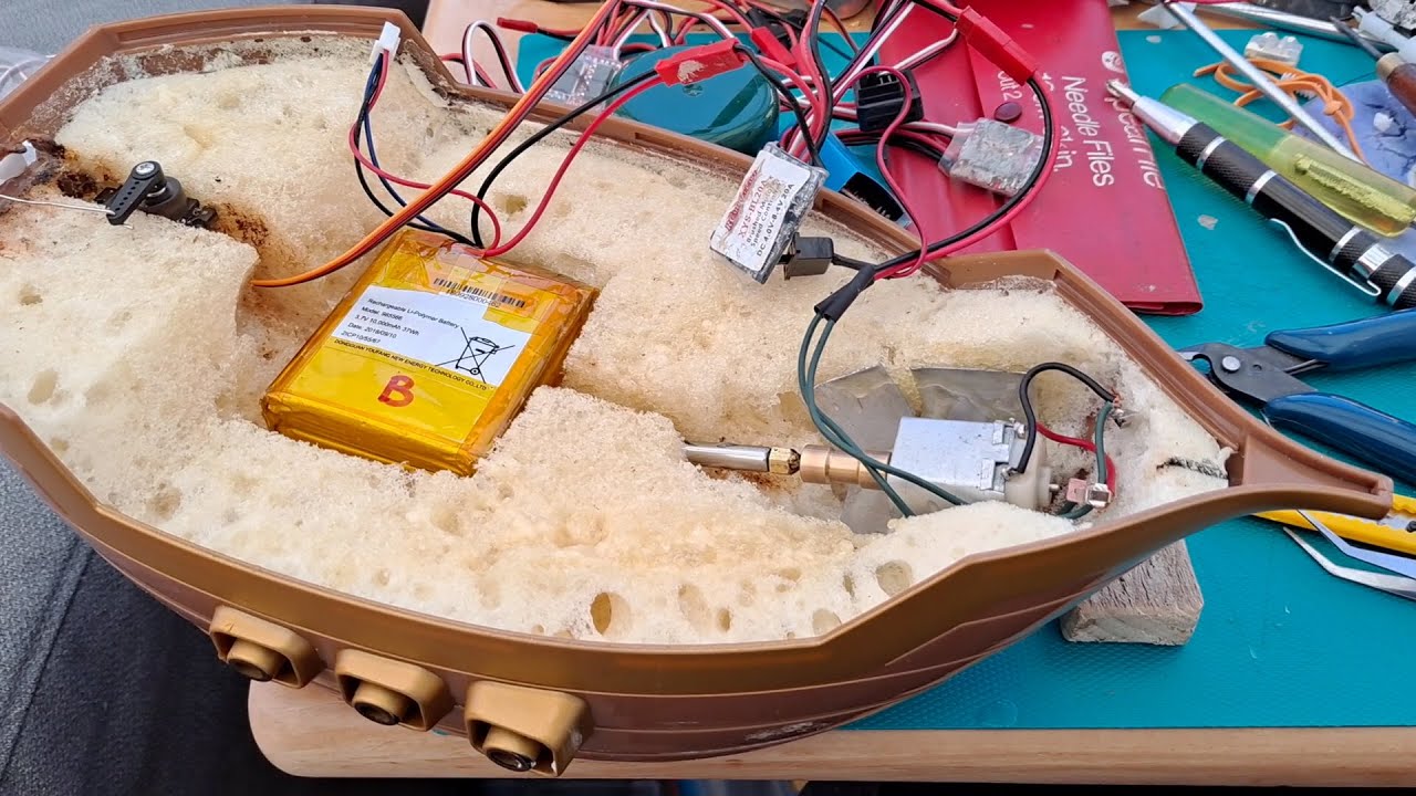 Toy pirate boat RC conversion PART 6 motor in place and a rudder - YouTube