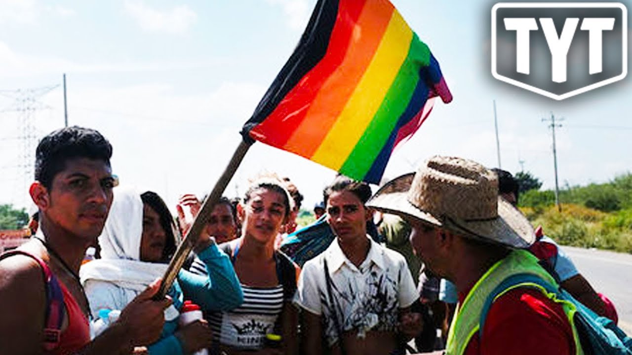 Small Group Of LGBTQ Migrants Reach Border - YouTube