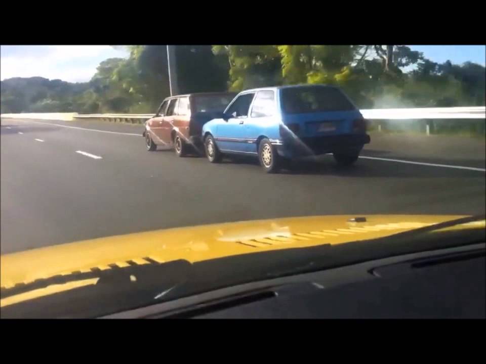 Suzuki 3 Cylinders Pushing Toyota 1.8 wagon on Higway Puerto Rico - YouTube