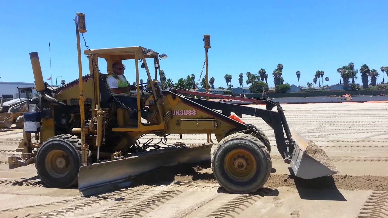 Laser grading sand by The Graders Inc - YouTube