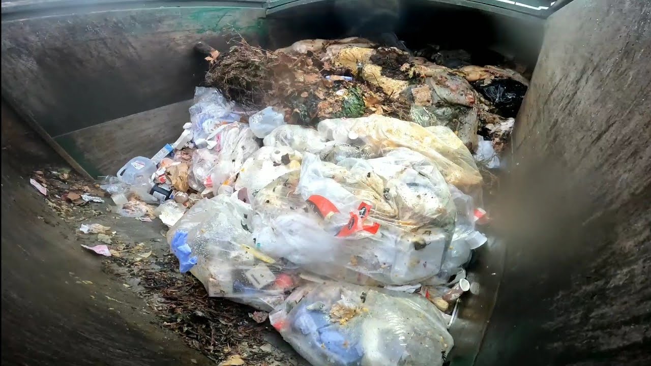 Waste Management Autocar/Heil front loader garbage truck p.o.v packing ...