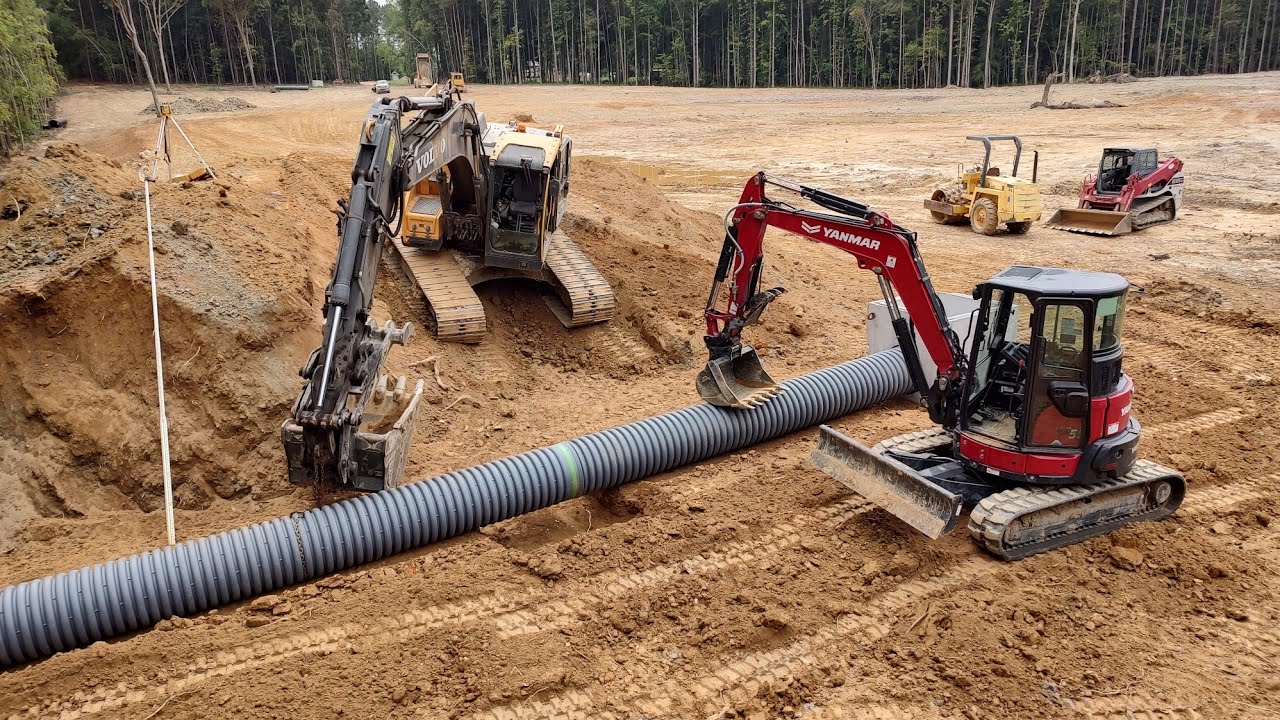 Installing The Overflow On The 5 Acre Pond - YouTube