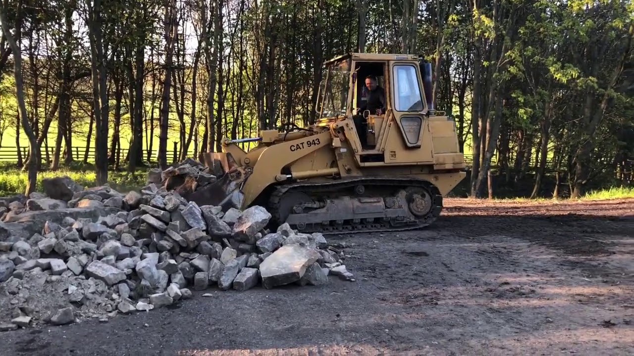 CAT 943 Track Loader At Work - YouTube