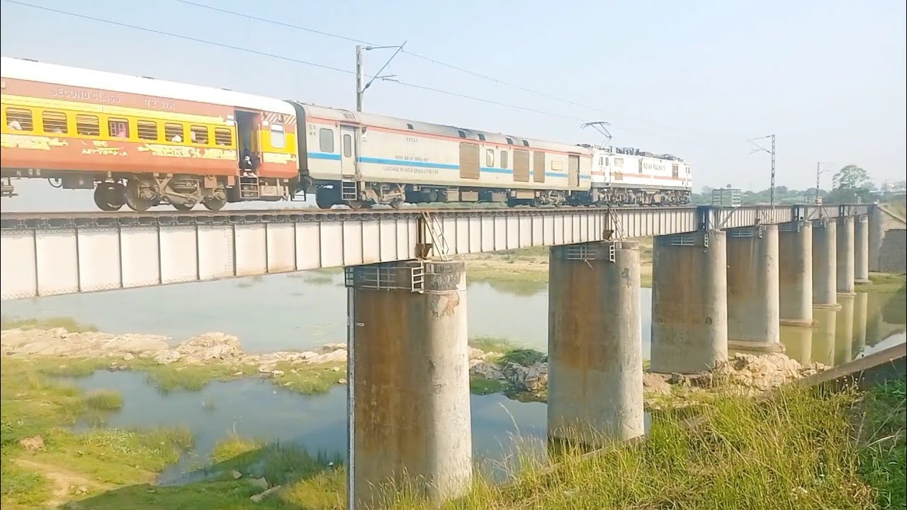 Passanger train passing river bridge #erail_special #train # ...
