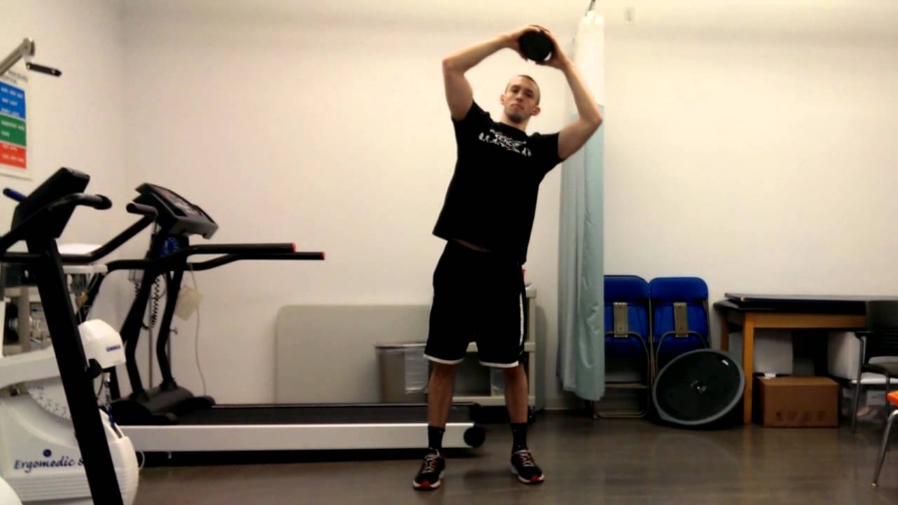Trunk lateral bend with overhead weight - YouTube