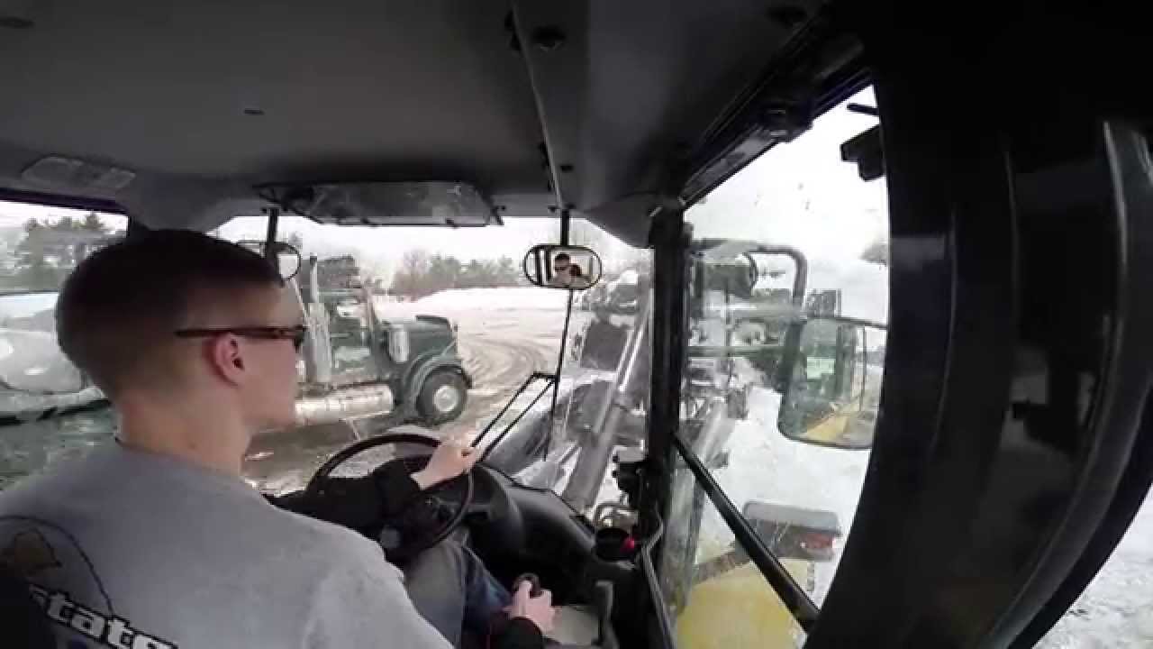 Komatsu WA200 Loading Two Tri Axles With Snow - YouTube