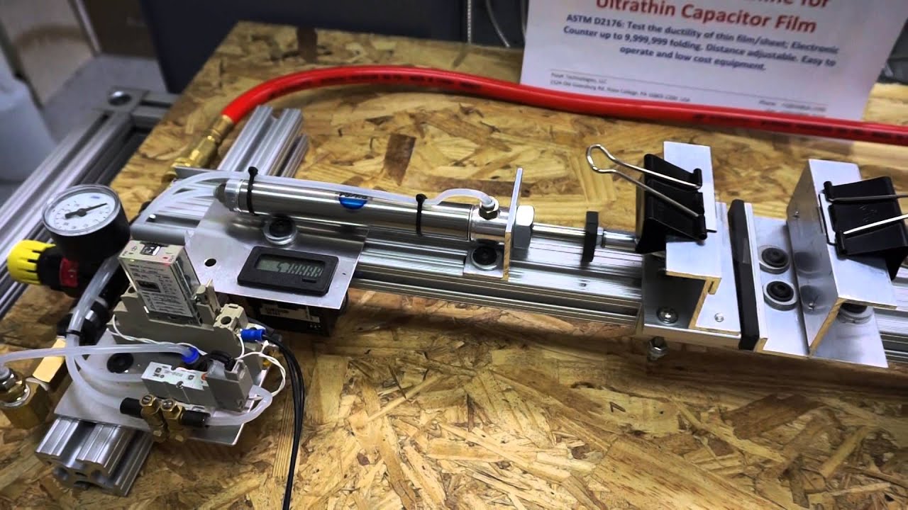 Folding test machine by Poly K Technologies. - YouTube
