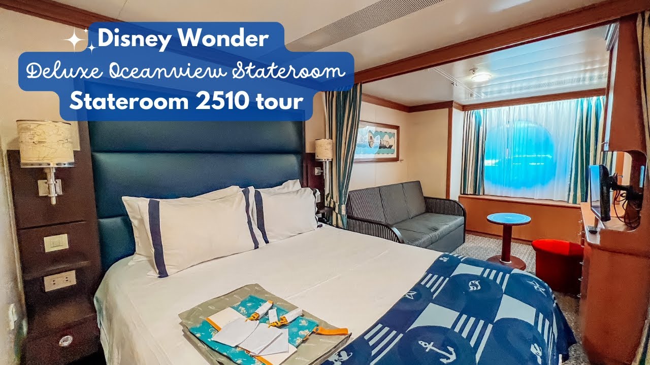 Disney Wonder Deluxe Oceanview Stateroom with one large porthole ...