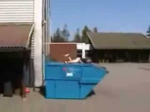some guy jumping on a Trash garbage bin can - YouTube