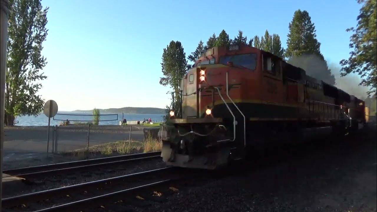 (Southbound) BNSF 288 leads Job 360 through the Sunnyside Beach Pedestrian Railroad Crossing ...