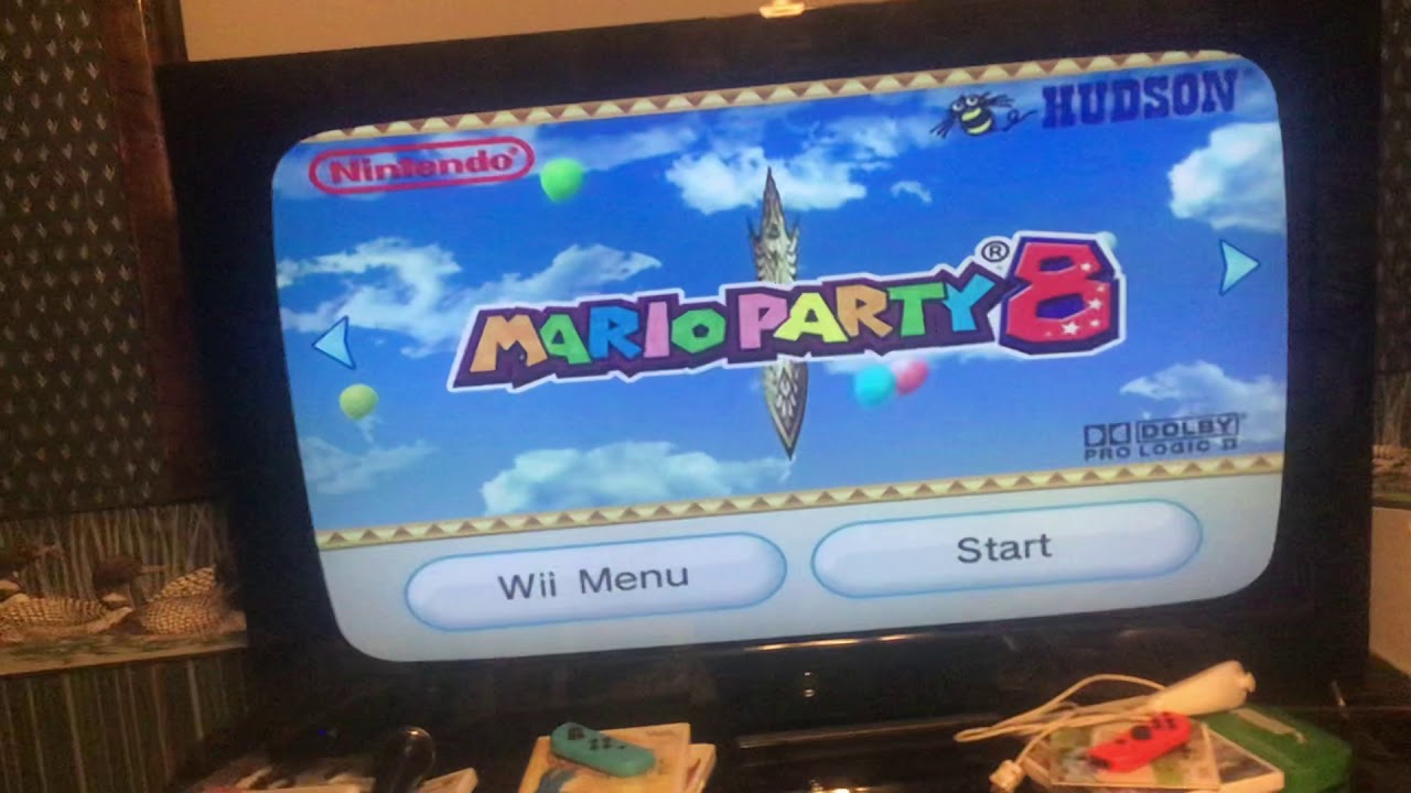 How To Insert A Disk Into the Wii - YouTube