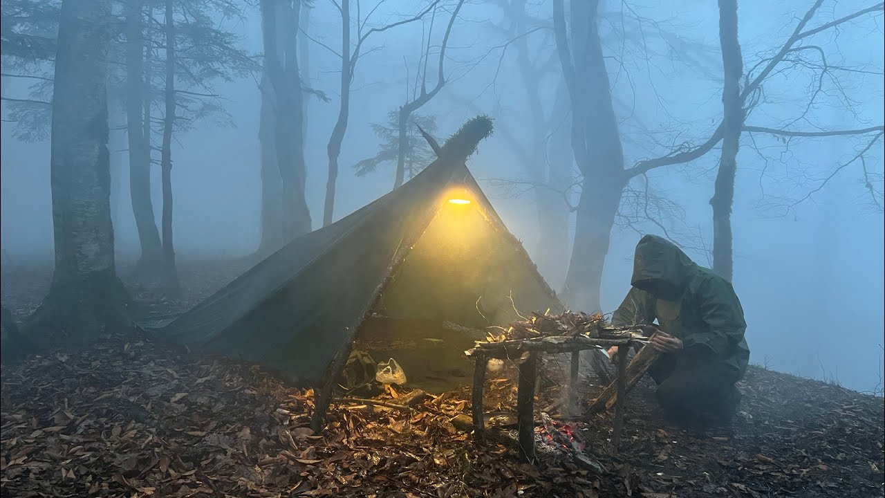 2 Days of cold winter camp in heavy rain | No tent and no sleeping bag ...