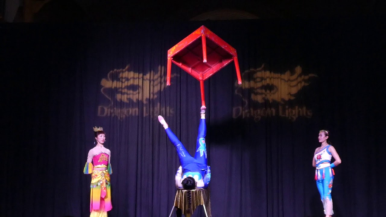Amazing foot juggling Chinese performer at Dragon Lights Festival - YouTube