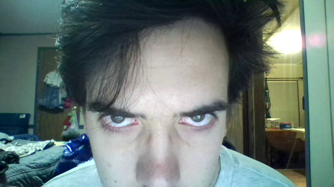 guy stares into webcam - YouTube