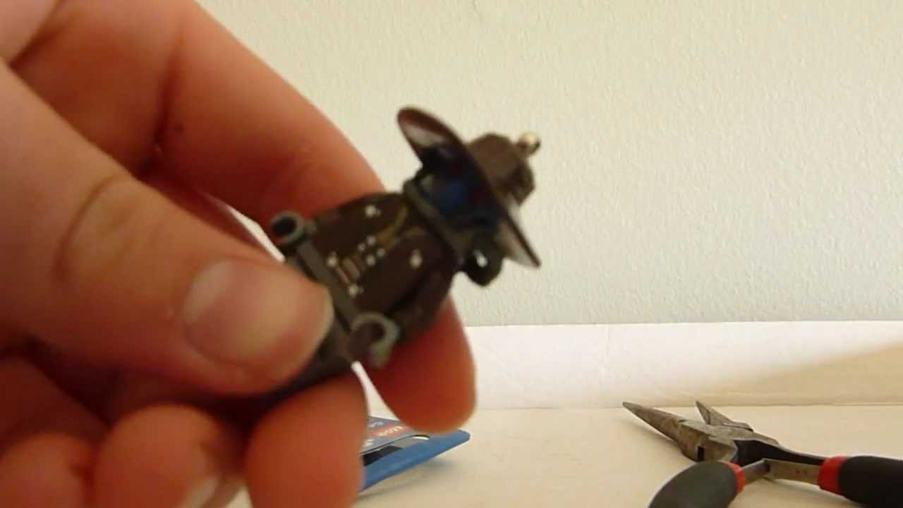 how to remove the keychain from a lego minifigure [EASY] - YouTube