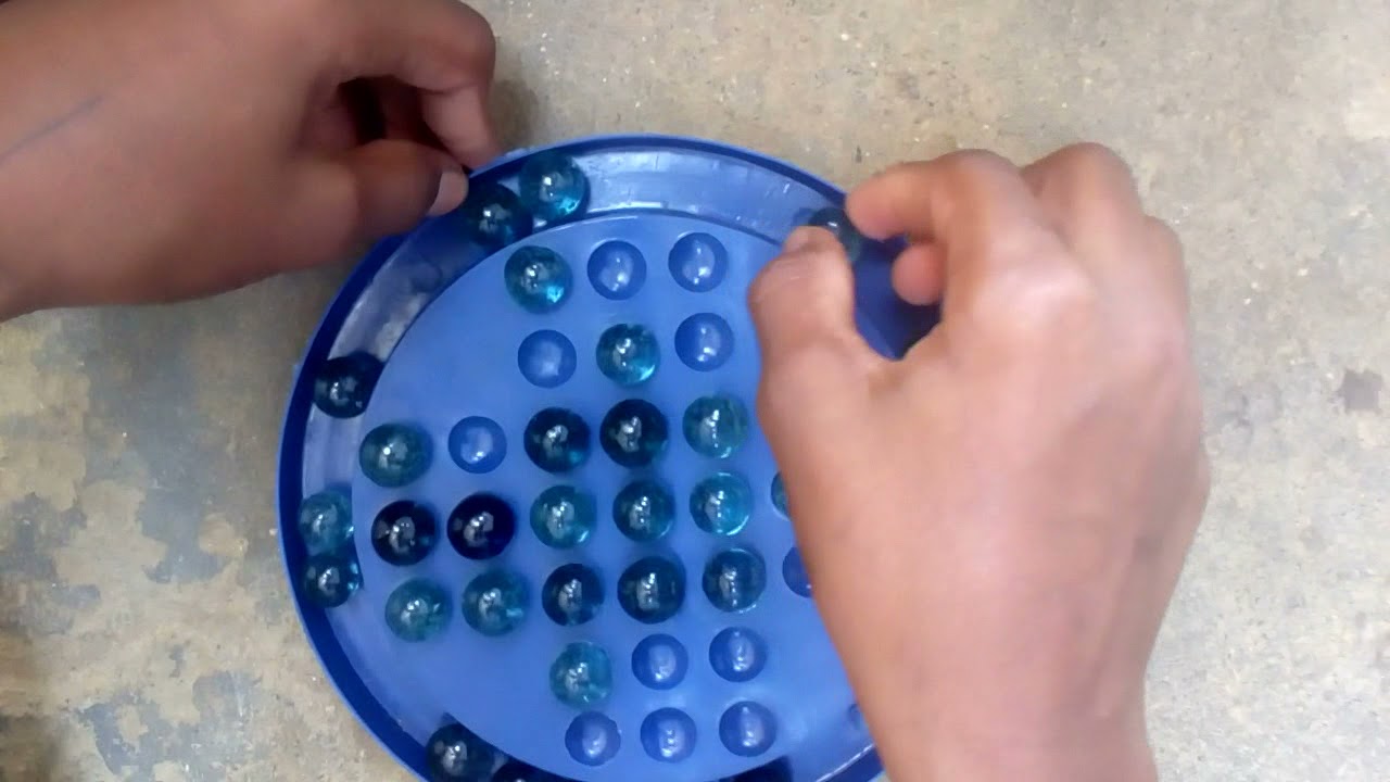 How to play goli game (brainvita) - (tamil) - YouTube