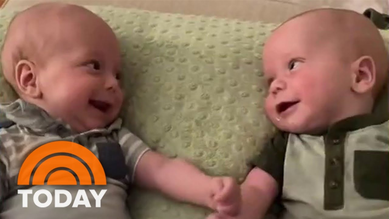 Watch twin babies discover each other for the first time - YouTube
