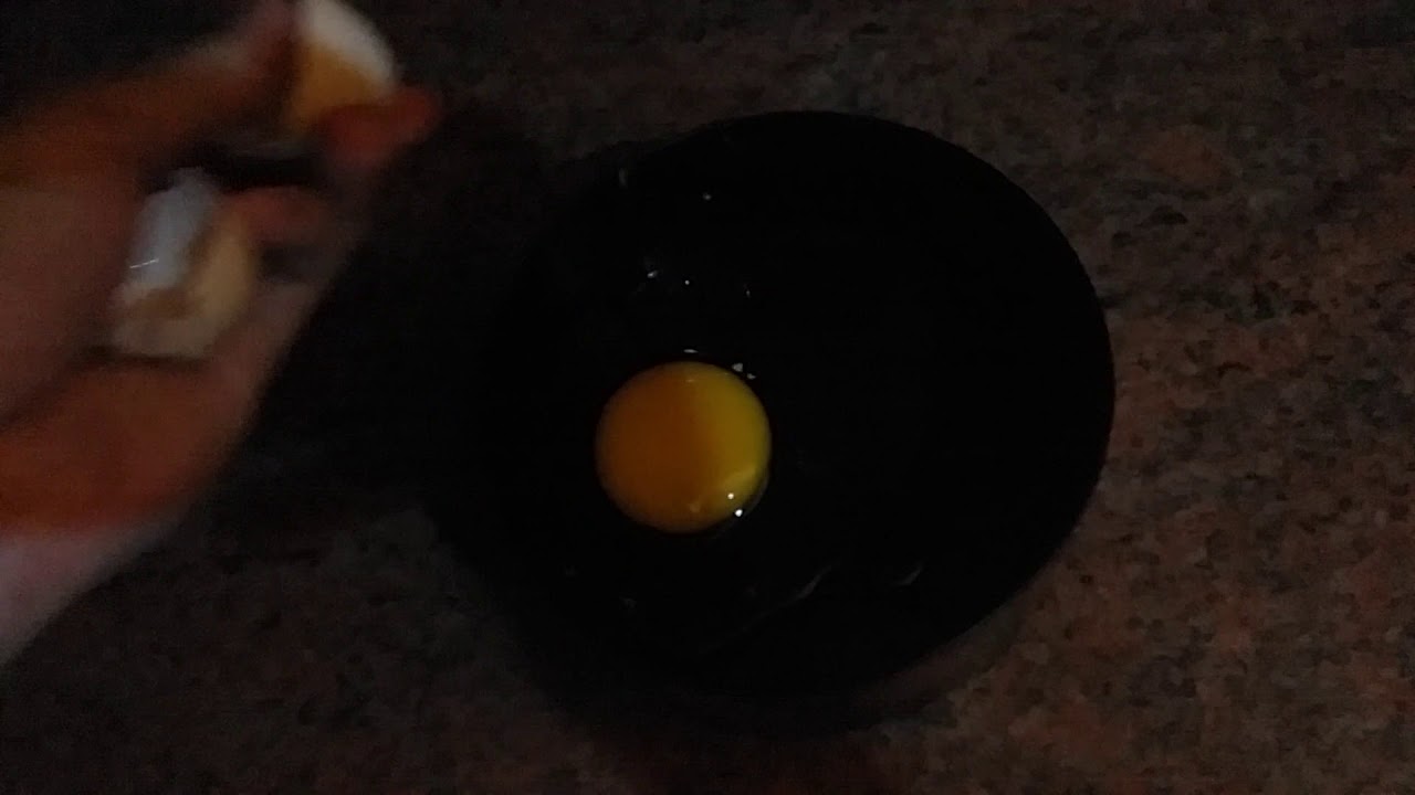 Cracking open an egg - YouTube