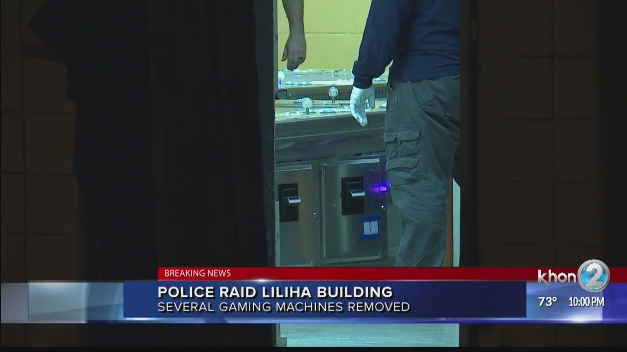 Police raid building in Liliha, gaming machines removed - YouTube