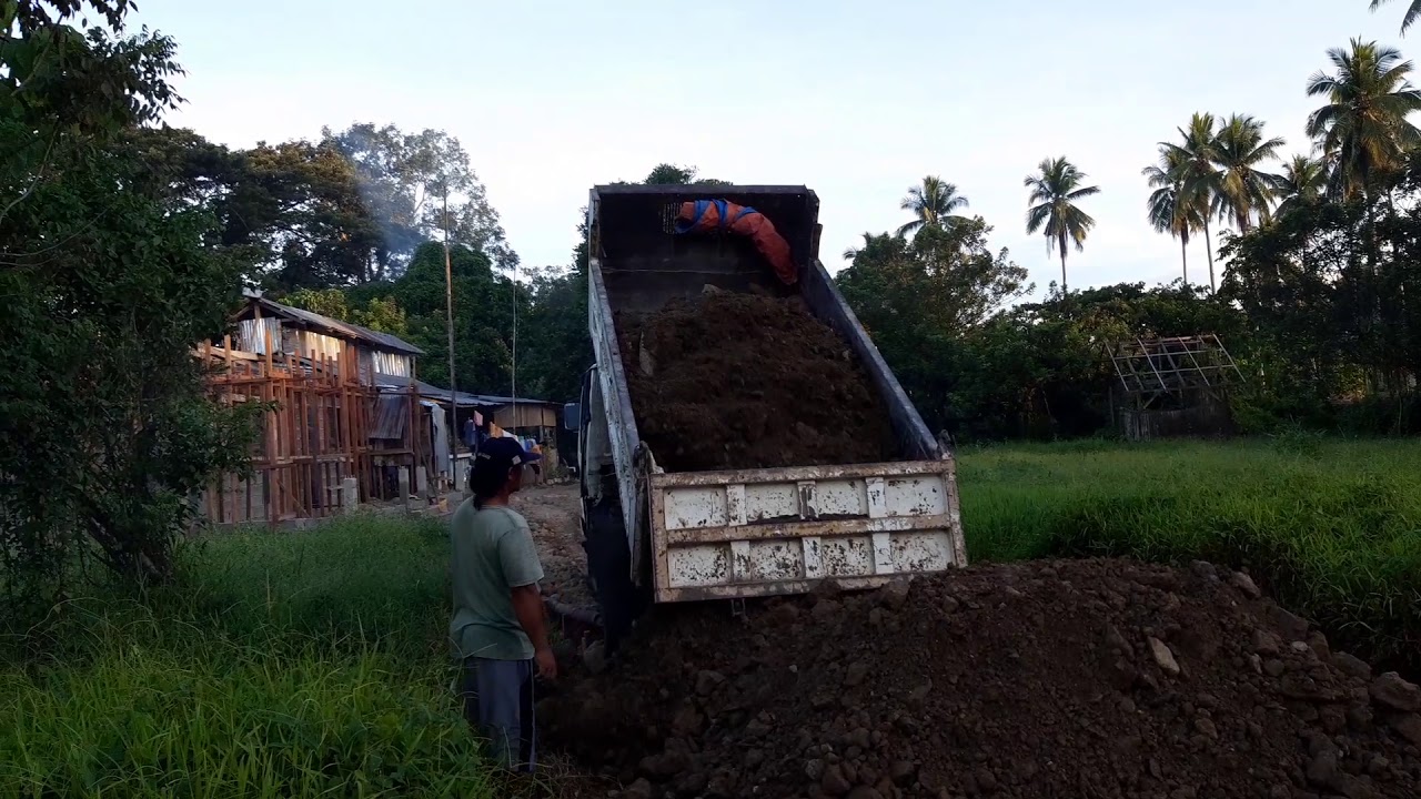 Building a house part 1 - Earth fill - YouTube