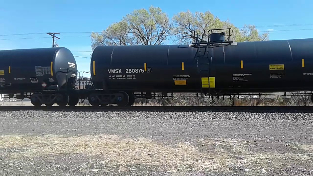 BNSF ethanol tank trains waves at us - YouTube