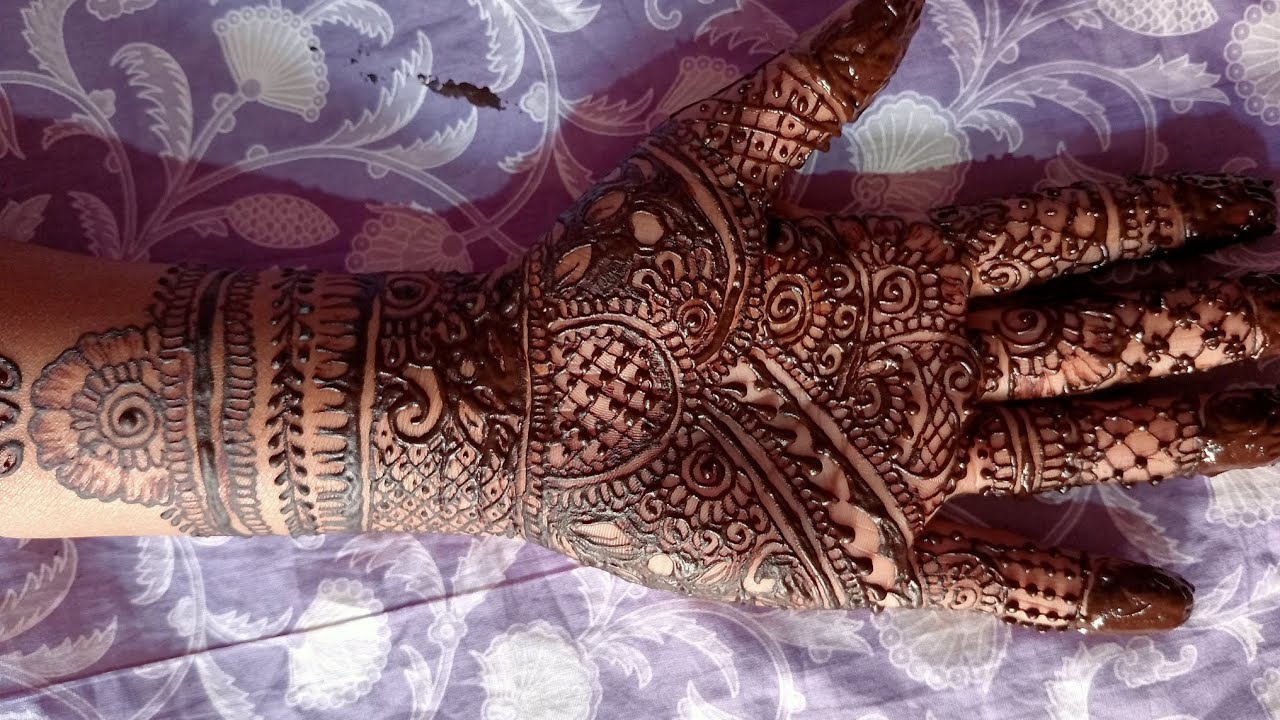 Mehndi Special Bridal Mehndi Designs | kalash Swastik indian Bridal ...