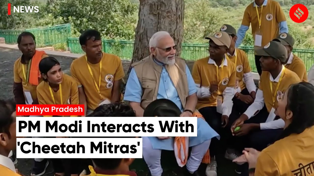 PM Narendra Modi seen interacting with 'Cheetah Mitras' after releasing ...