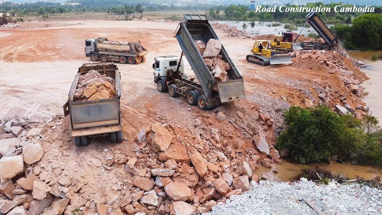 Continue Project Backfill Pond By KOMATSU D68E Dozer Pushing Stone To ...