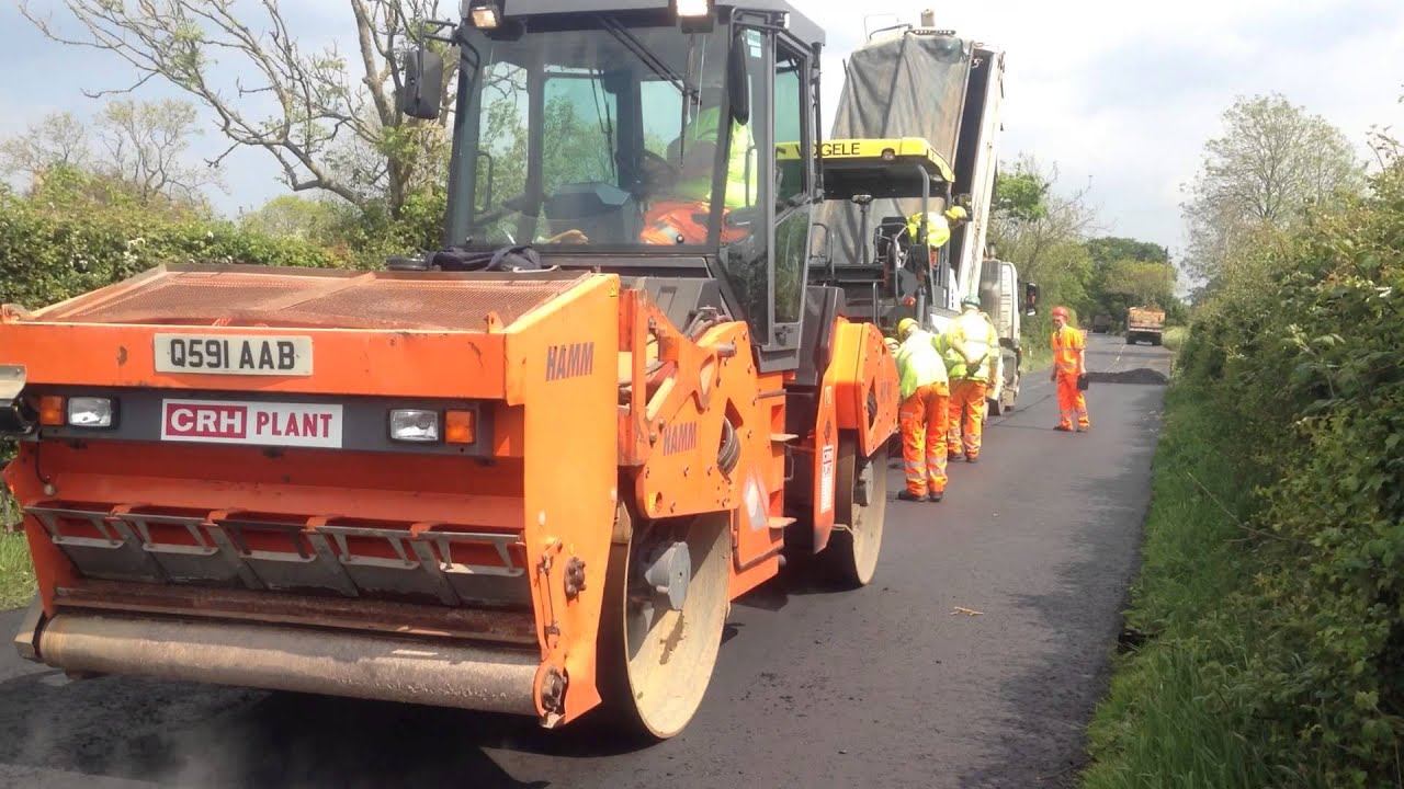 NR Asphalt | Machine Laying Asphalt - YouTube