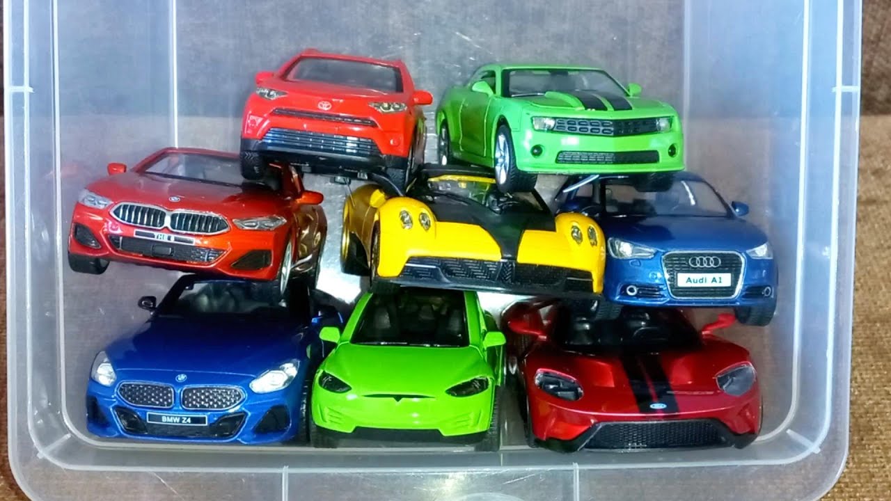 Some small colored car models from a big box - YouTube