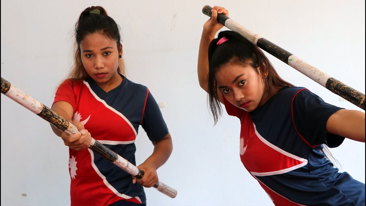 Hami Kheladi - 2 Bo Staff & Nunchaku Freestyle - Nepali Martial Art.Sanchita Magar & Pabitra ...