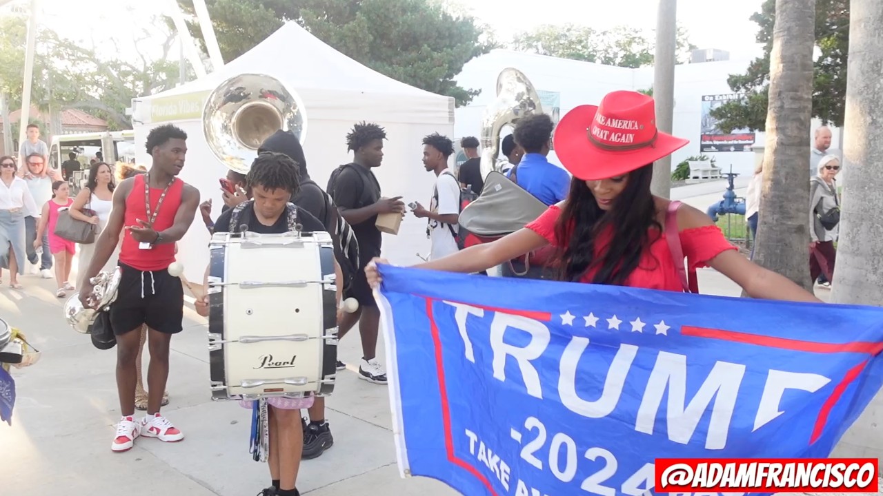 Black woman and Mexican man wear MAGA hats on St. Petersburg Pier - YouTube